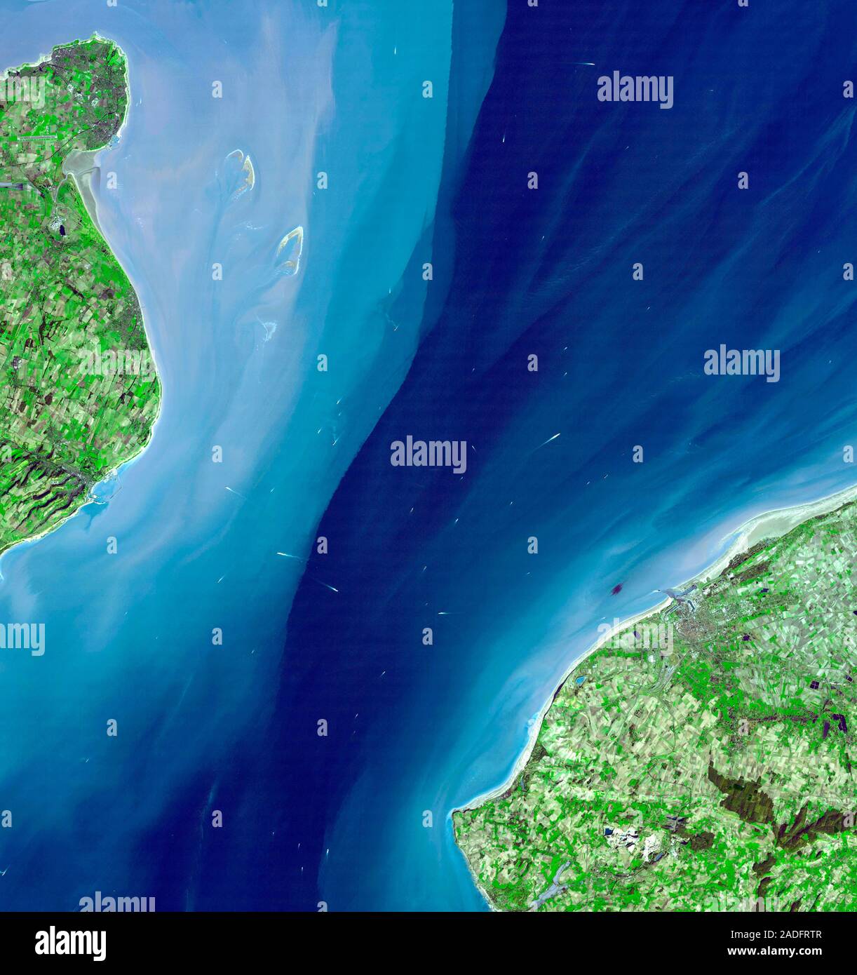 Strait of Dover, satellite image. Sea is blue, vegetation green. The ...