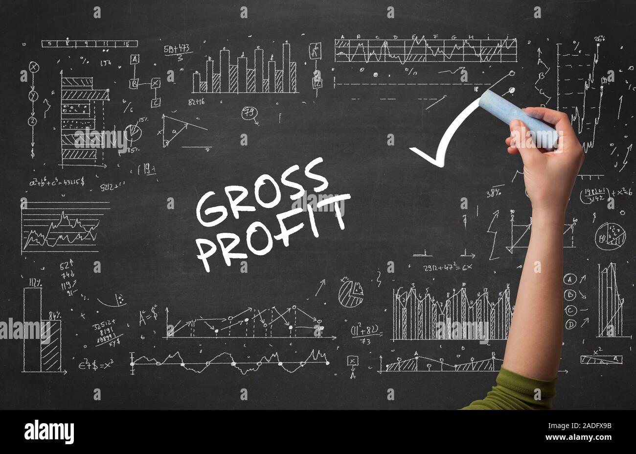 Hand drawing GROSS PROFIT inscription with white chalk on blackboard ...