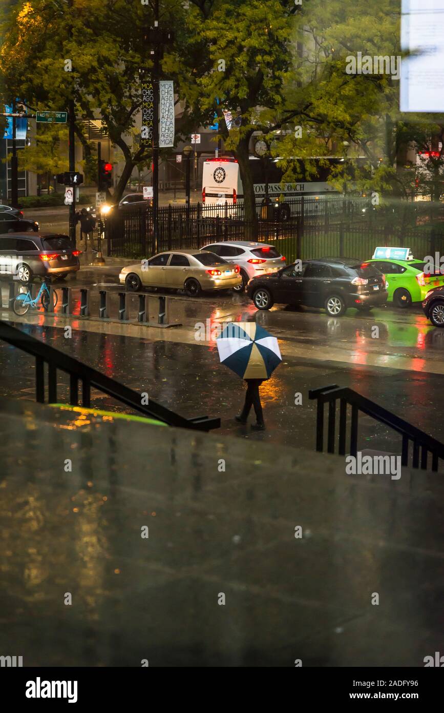 Downtown traffic at night in the rain, Chicago, Illinois, USA Stock ...