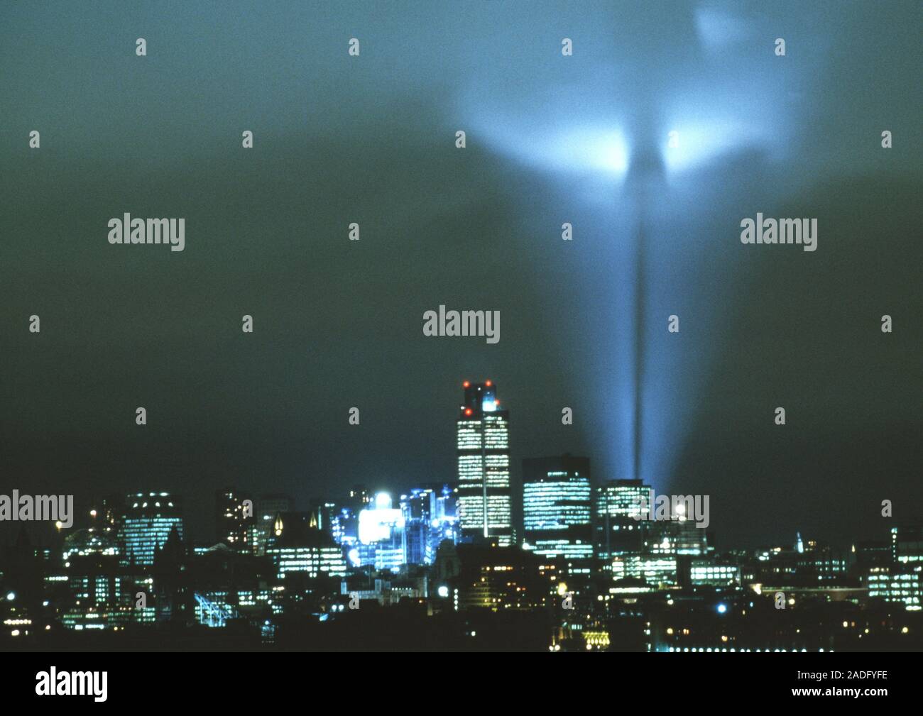 London skyline at night, showing the large searchlight (lower to top ...