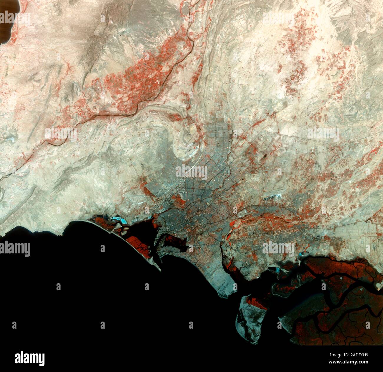 Karachi, Pakistan, satellite image. North is at top. Water is black ...