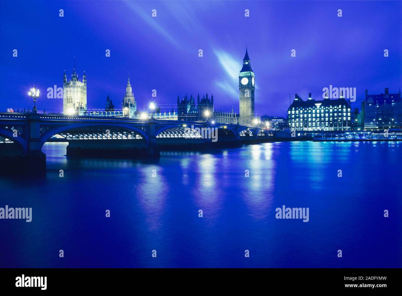London landmarks at night. Three landmarks on the River Thames at ...