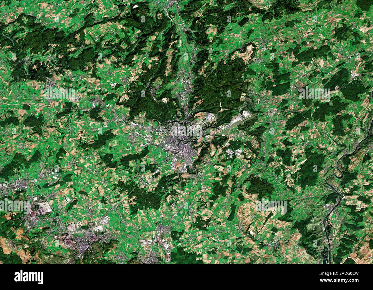 Luxembourg city, satellite image. North is at top. Forest is dark green ...