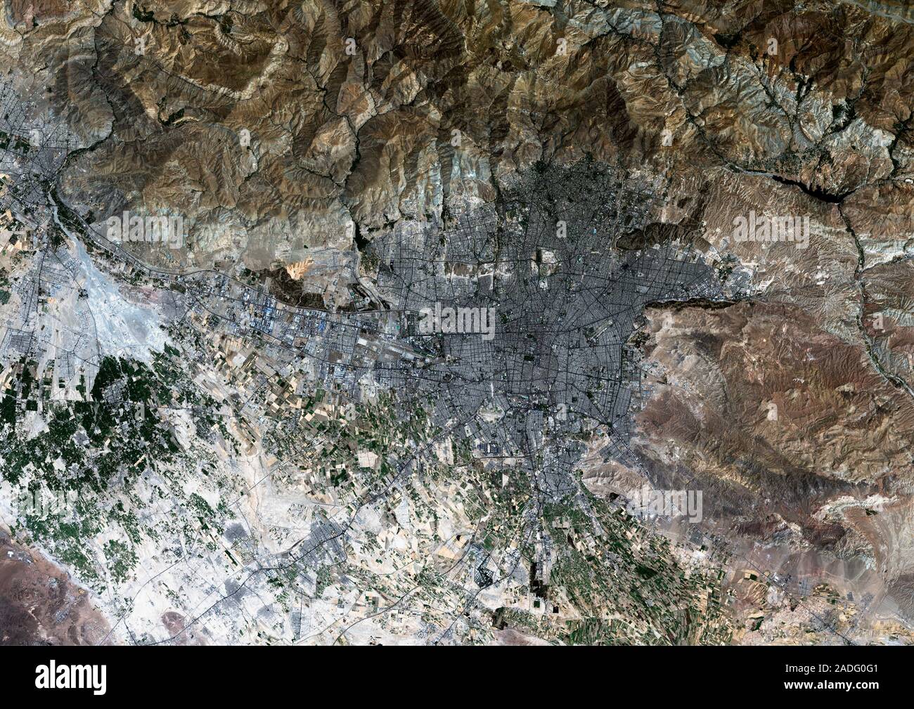 Tehran, satellite image. North is at top. Vegetation is green, arid ...