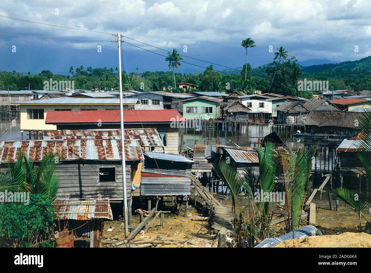 Slums in southern Brunei, built on stilts over the water Stock Photo ...