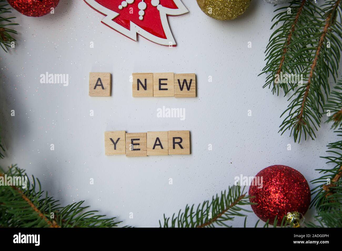 Xmas wooden tiles with text - Festive concept, branches of spruce tree ...