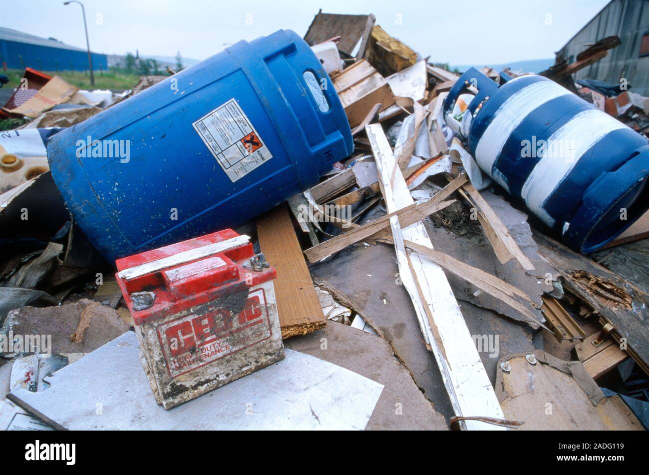 Fly-tipped waste, including a car battery and ammonia liquor ...