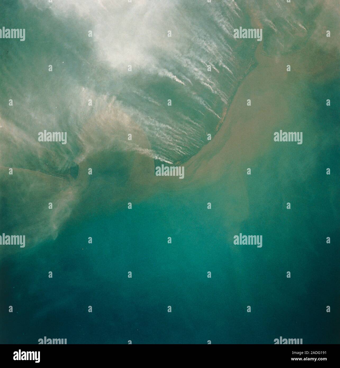 Smoke plumes rising from fires in the marshland of the Tengah region of ...
