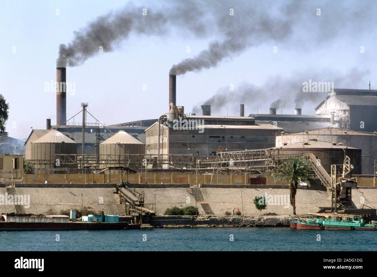 Air pollution, containing particulates (small, solid particles), being ...