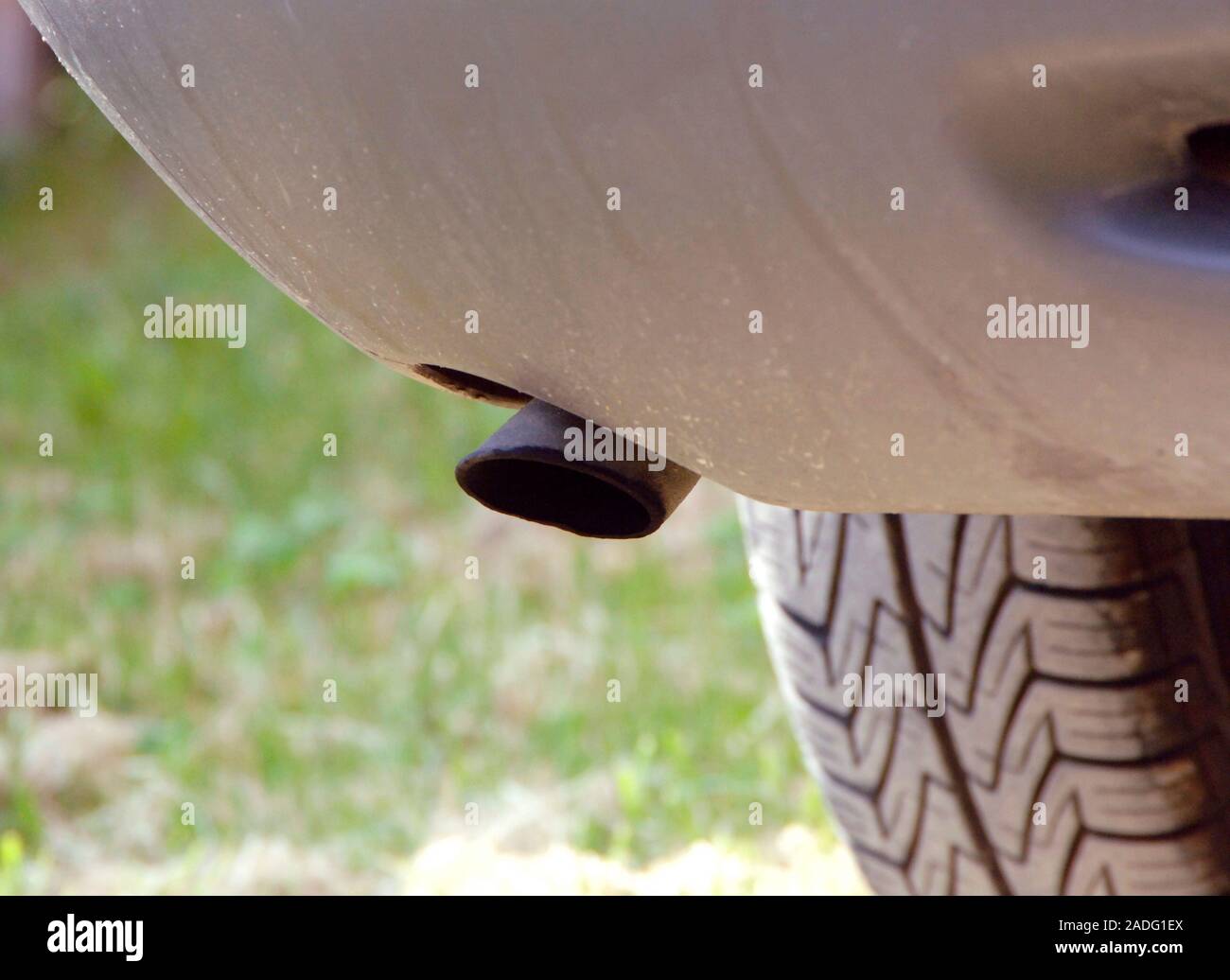 Motor vehicle exhaust gases. Close-up of the exhaust pipe of a motor ...