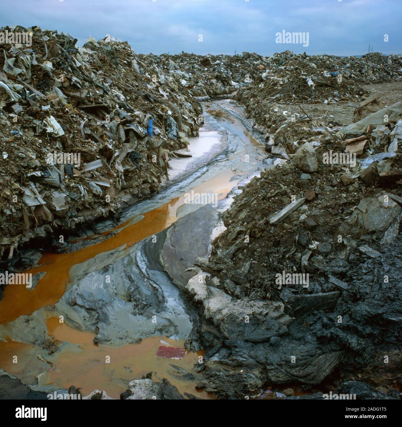 Water pollution. Toxic chemical waste in a stream at a toxic waste dump ...