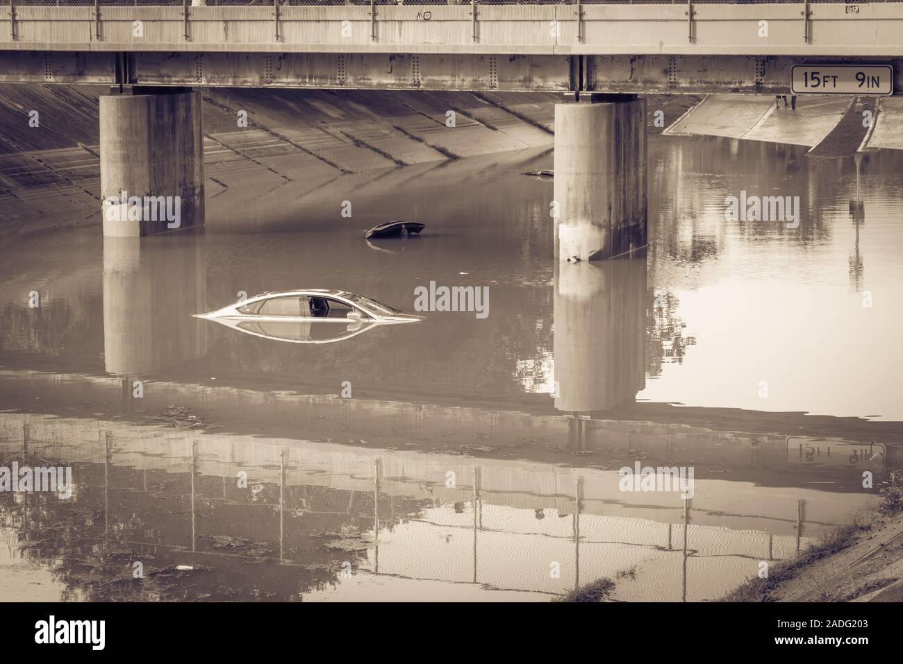 15 feet and 9 inches bridge highway elevated with flooded cars near ...
