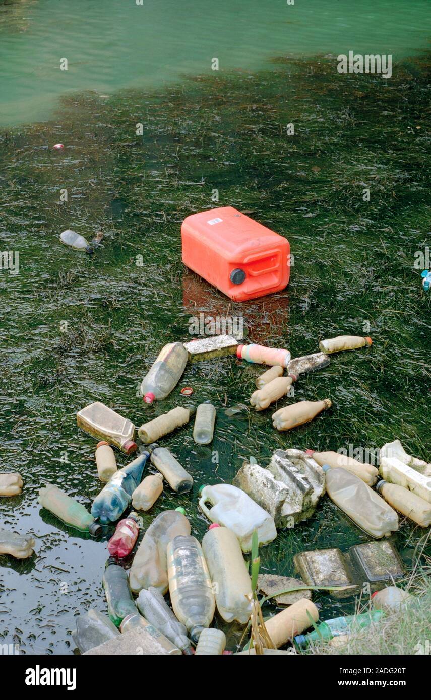 Rubbish floating in a canal. Photographed in Bilston, West Midlands, UK ...
