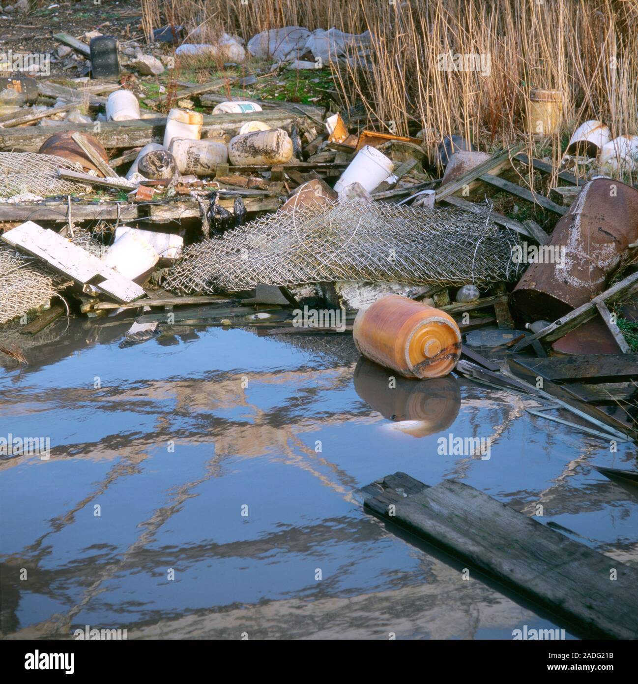 Polluted river. Industrial waste dumped in a water course near the ...