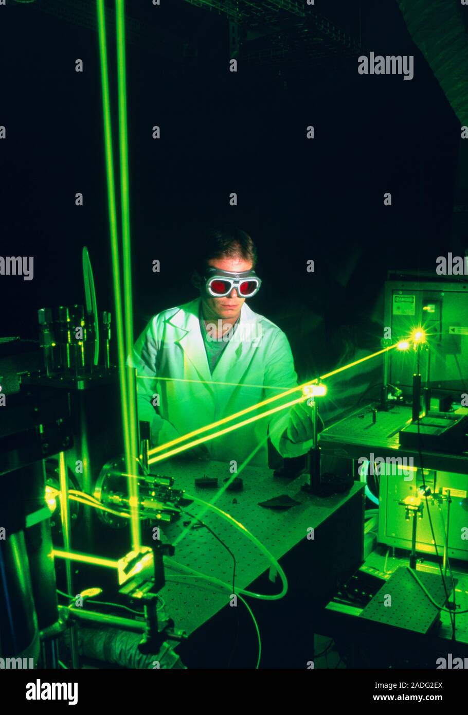 Pollution monitoring equipment. Technician operating a pump and probe ...