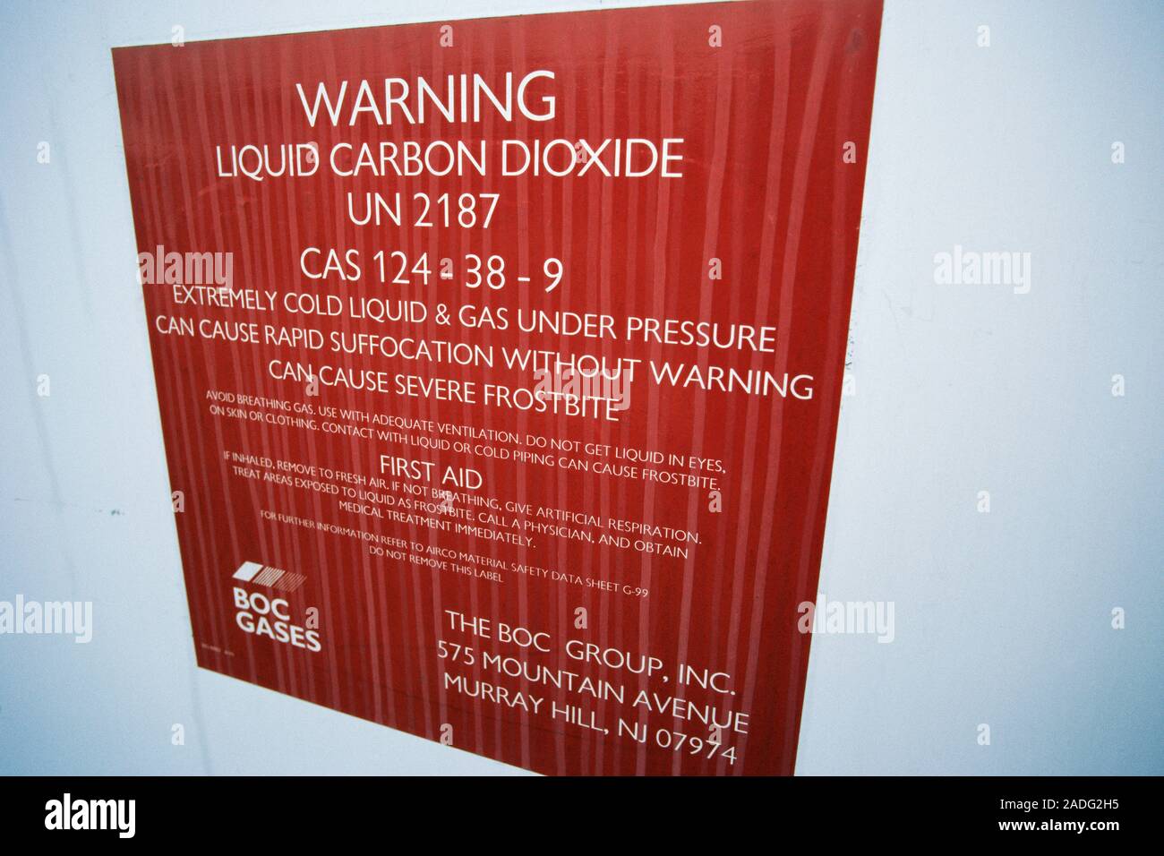 Carbon dioxide tank. Warning sign on a tank of liquid carbon dioxide ...