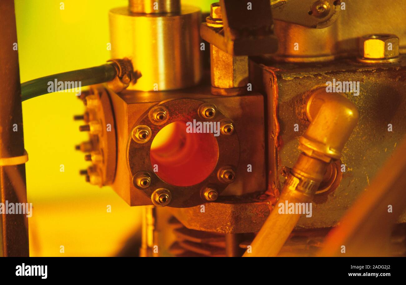Car pollution research. Optical access port (glass window, round) in an ...