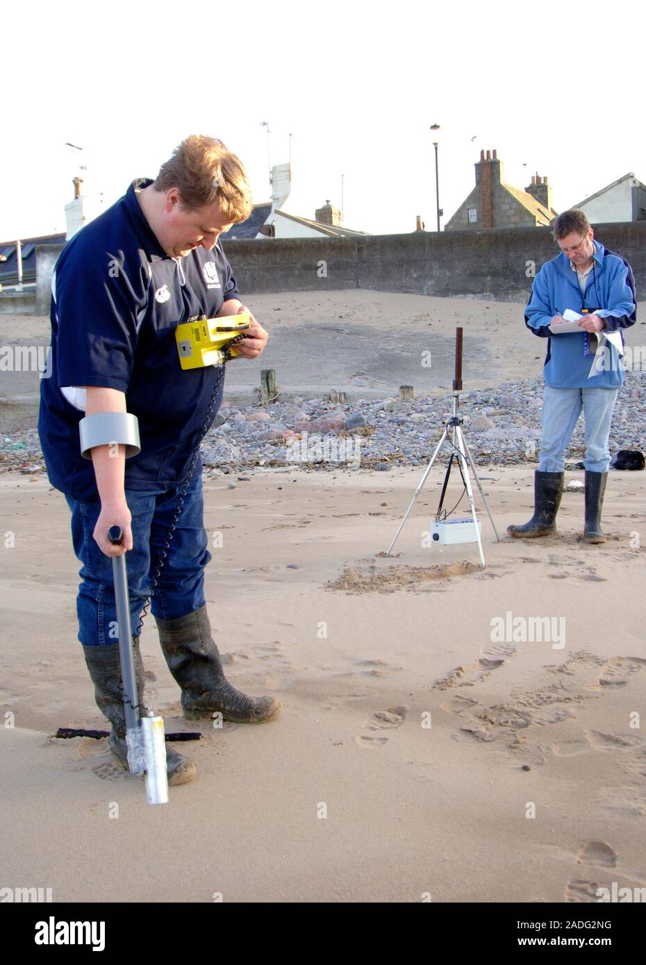 Coastal radiation monitoring. Researchers using radiation detectors on ...