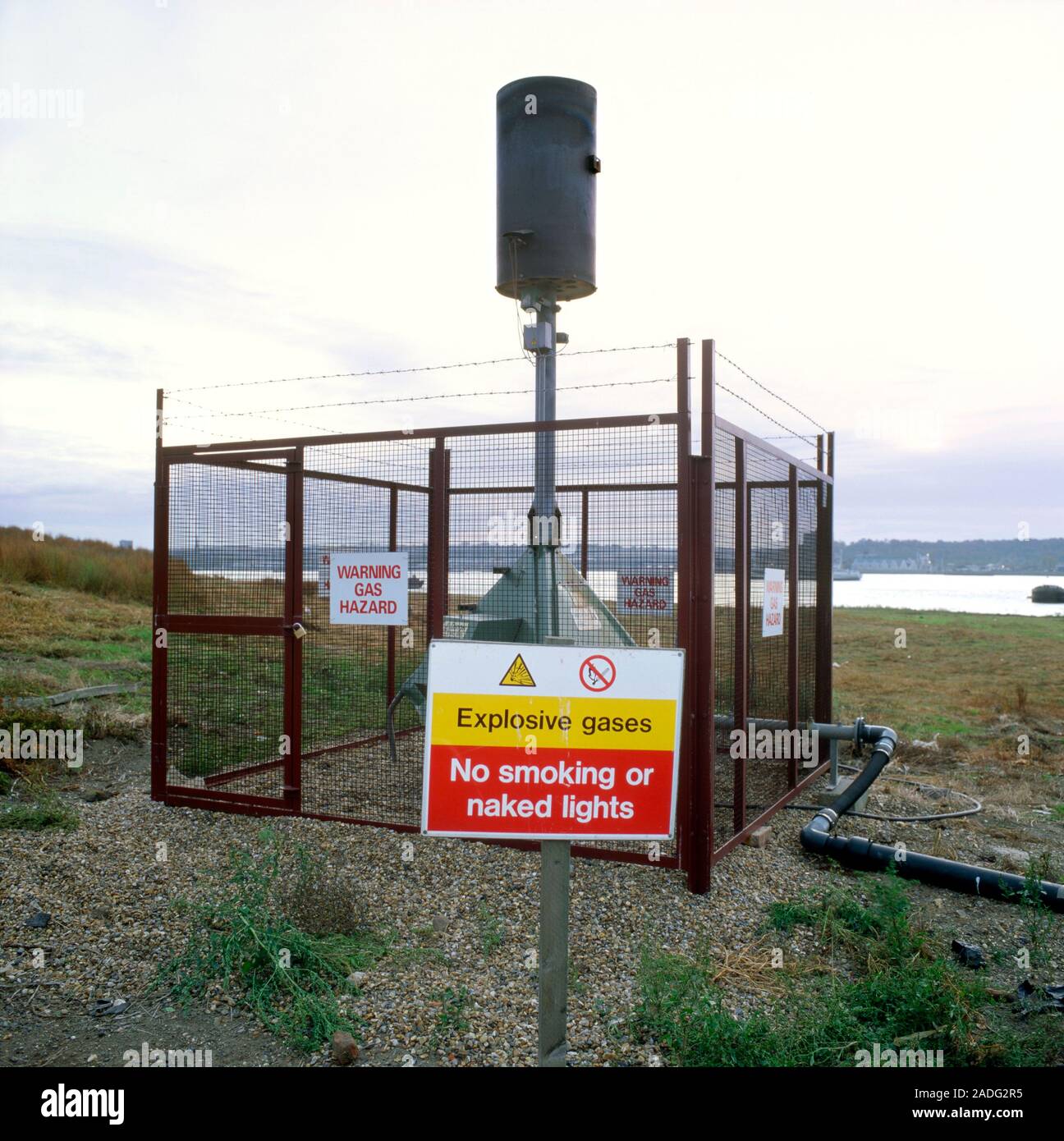 Landfill gas vent at a landfill site. Landfill gas (LFG) is an ...