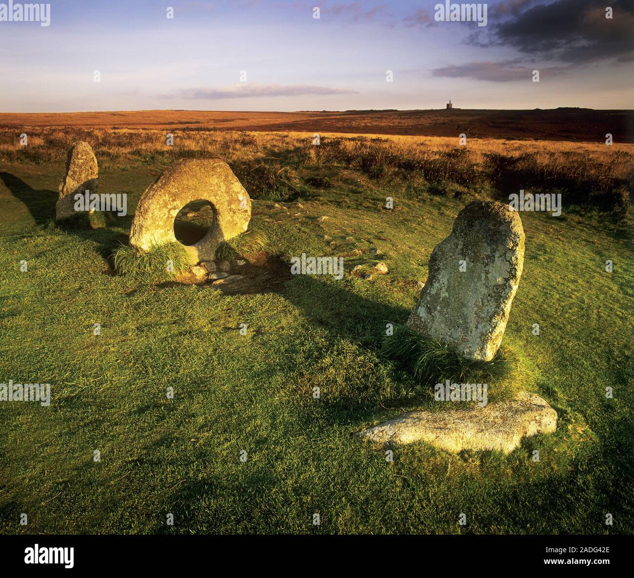 Men-an-tol standing stones at sunset. This formation of standing stones ...