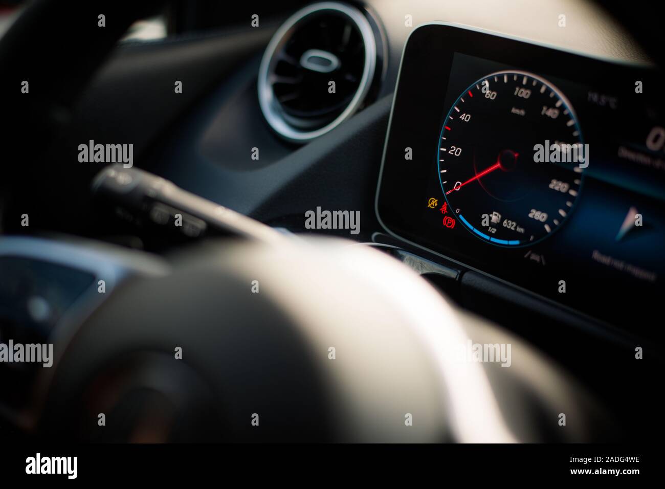 Close up shot with the digital speedometer on a modern car dashboard ...