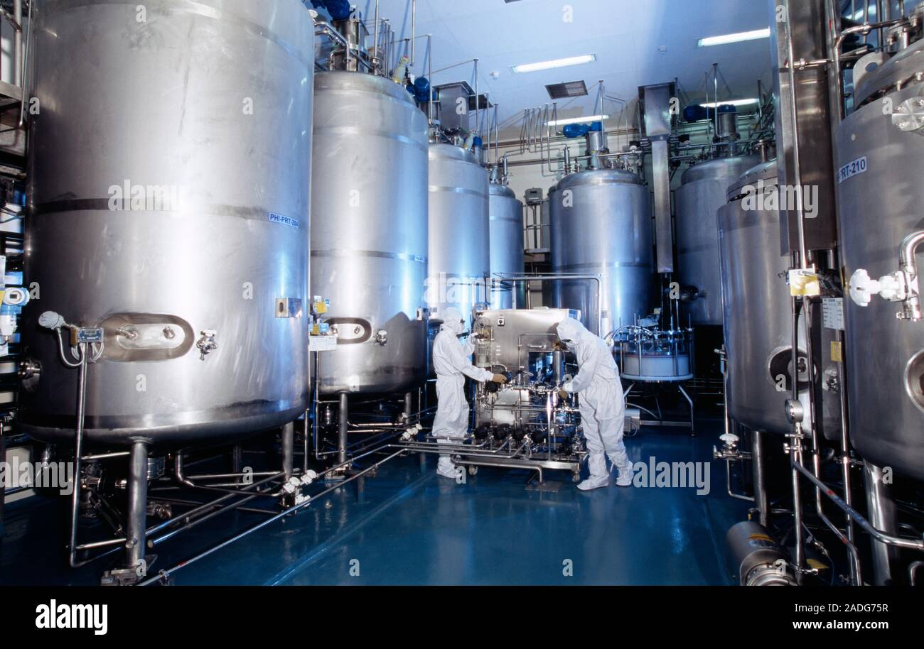 Insulin production. Scientists working in a facility for the production ...