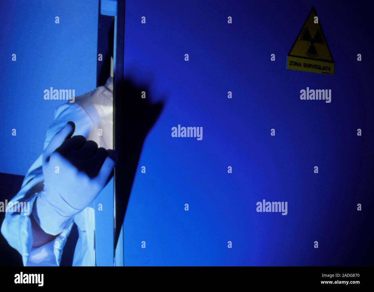 Secure laboratory. Researcher enters a secure laboratory facility. The ...