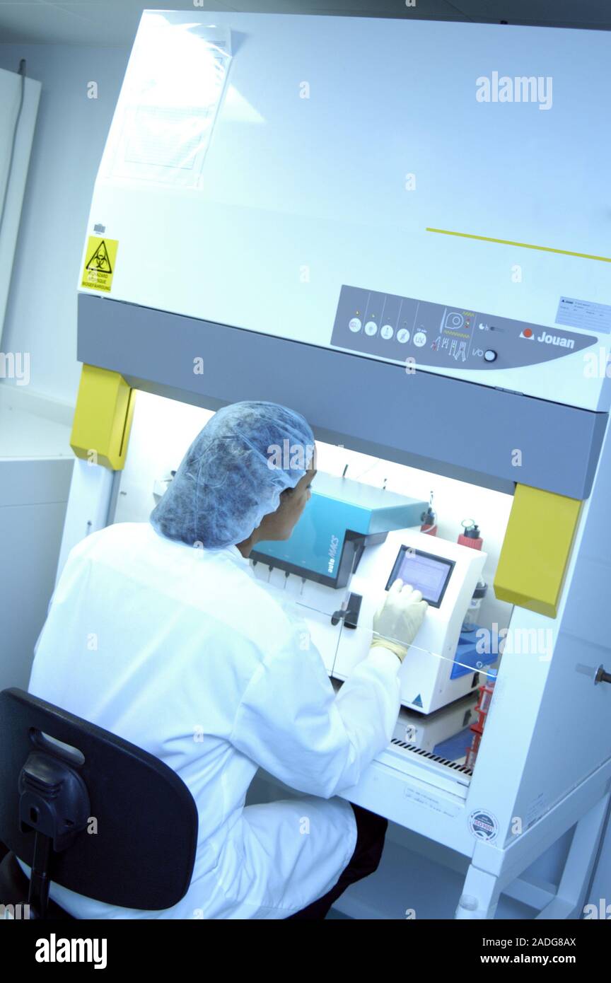 MODEL RELEASED. Cell research. A researcher separating different ...