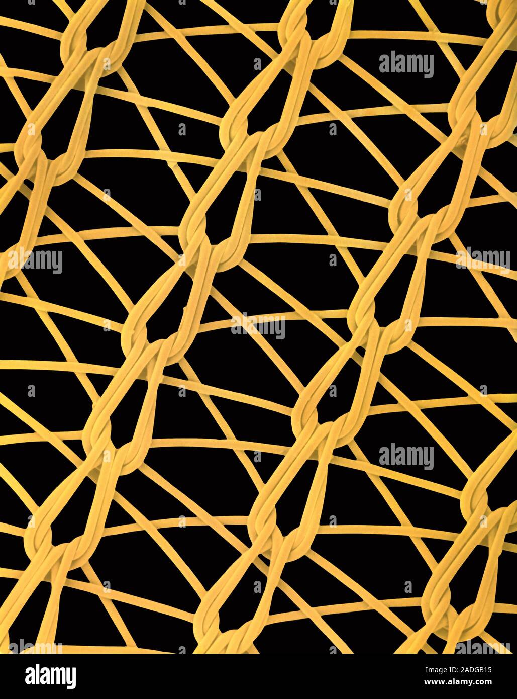 Nylon netting. Coloured scanning electron micrograph of a woven nylon ...
