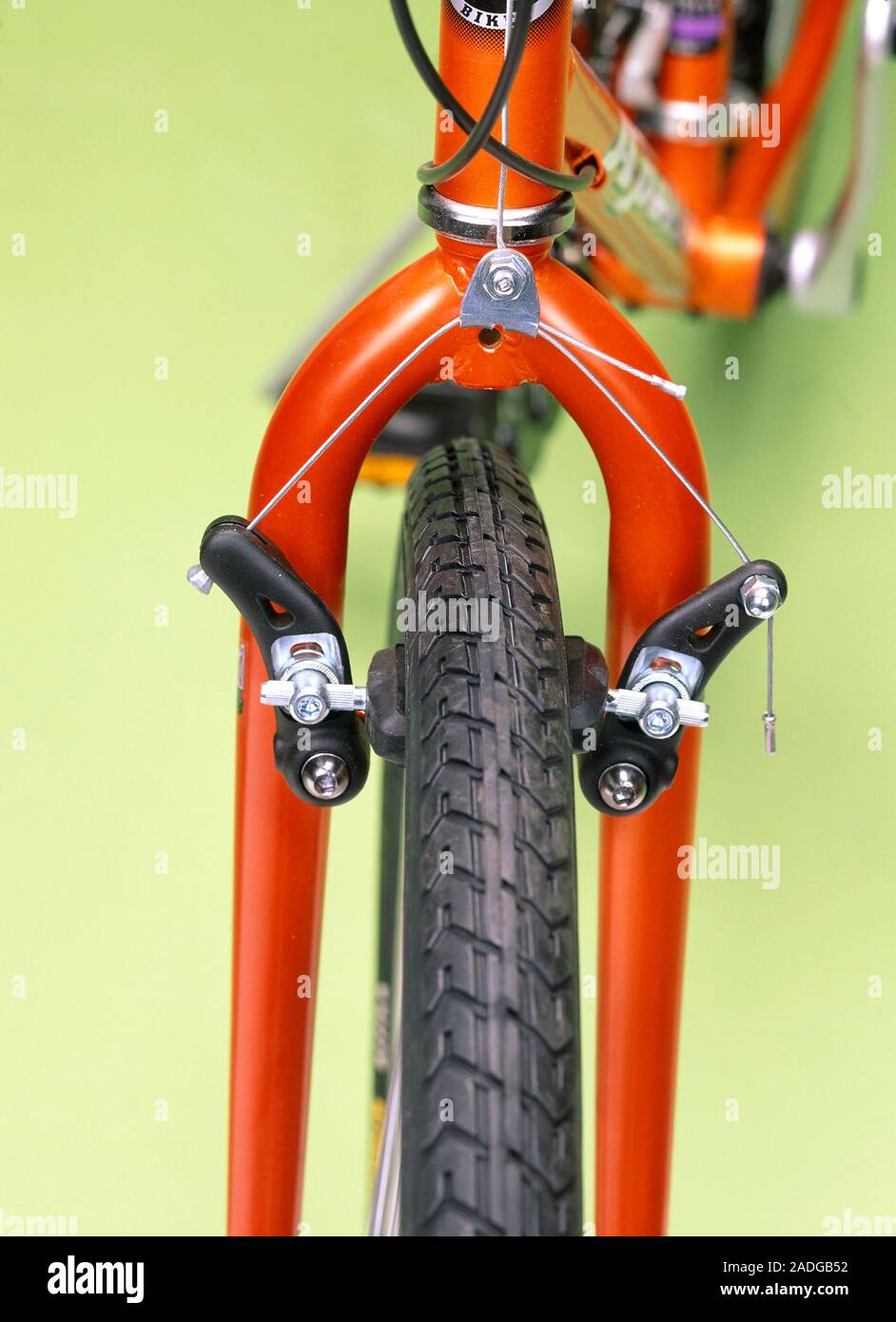 Bicycle brakes. Bicycle's front wheel showing the bicycle brakes ...