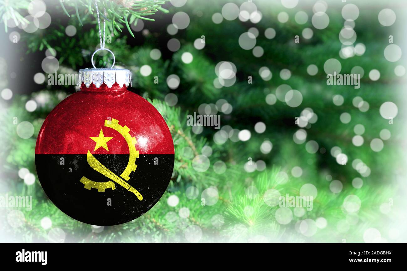 Christmas and New Year background with a flag of Angola Stock Photo - Alamy
