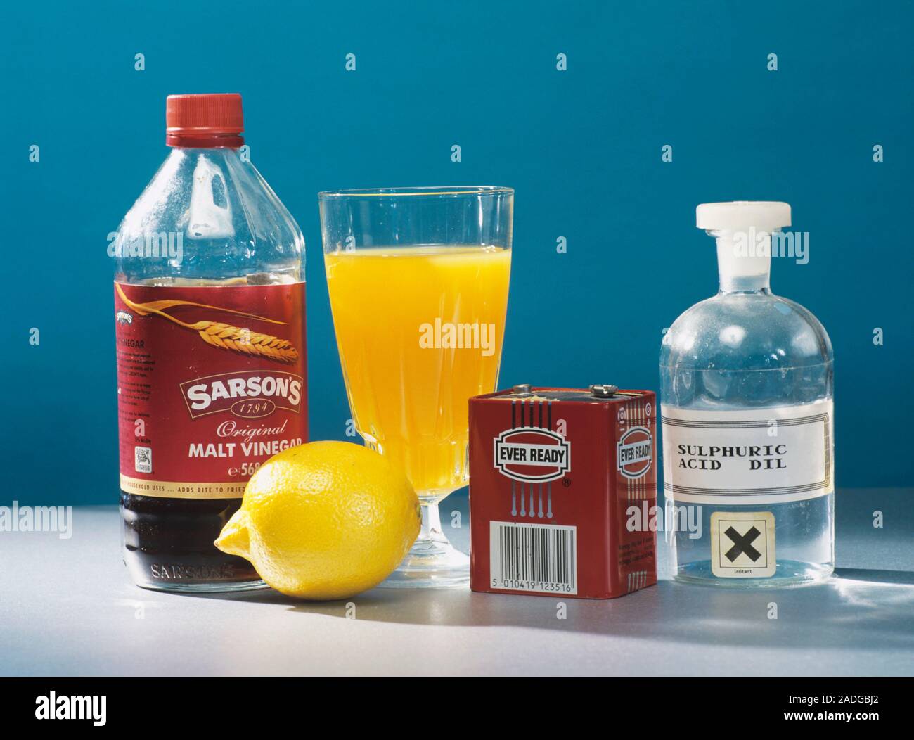 Selection of acids. Household products containing acids, alongside ...