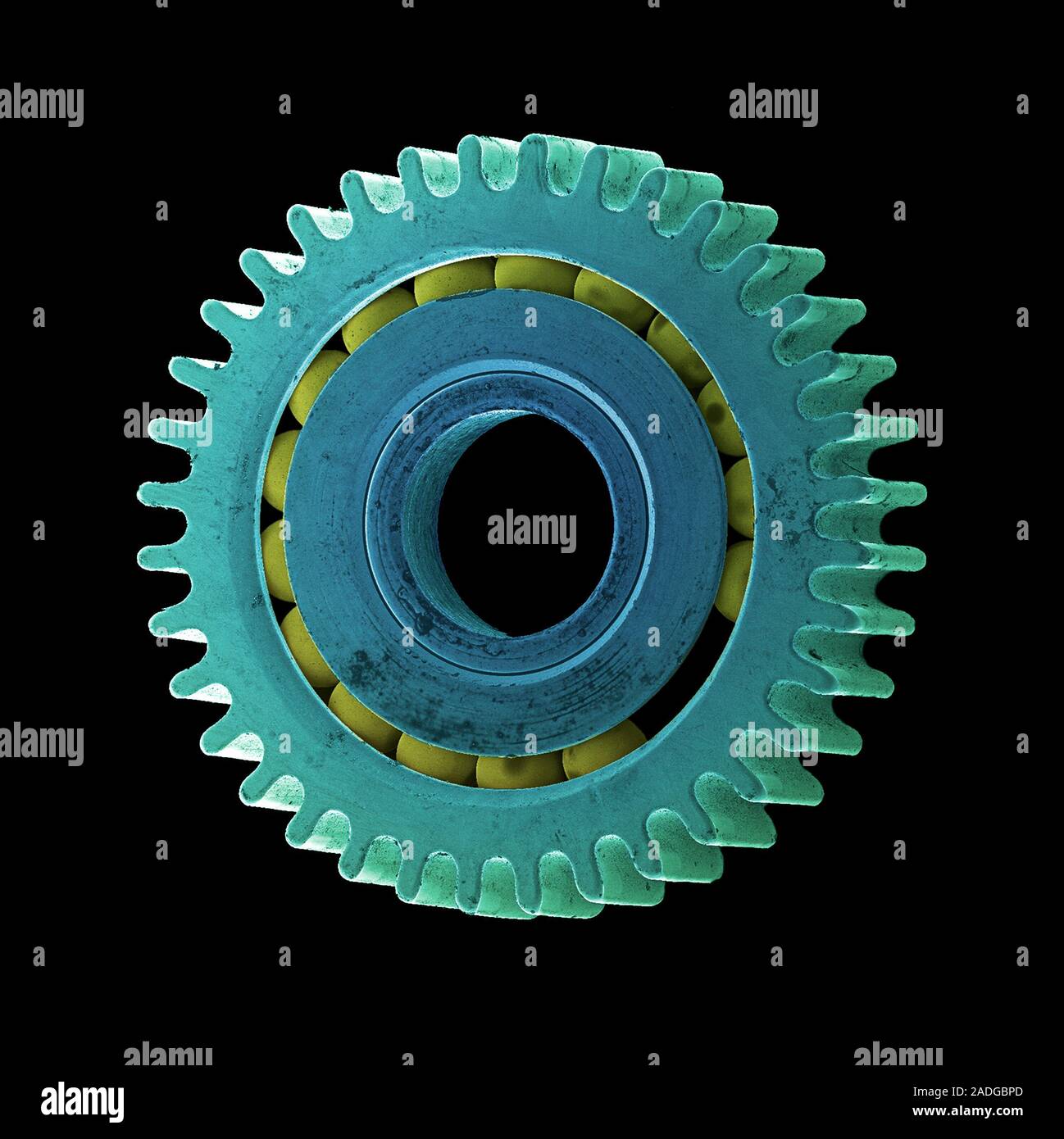 Watch cog, coloured scanning electron micrograph (SEM Stock Photo - Alamy