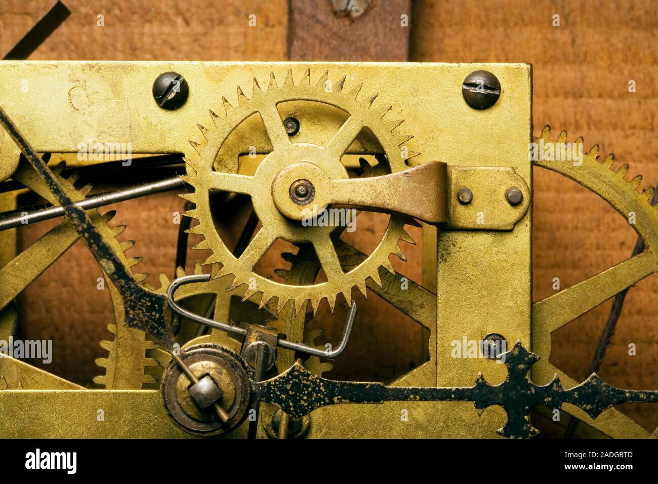 Clock mechanism. The cogs and gears of a clock mechanism seen close-up ...