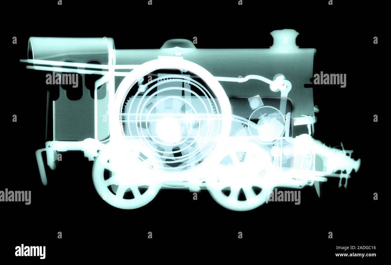 Spring train. X-ray showing the mechanism inside a toy train Stock ...