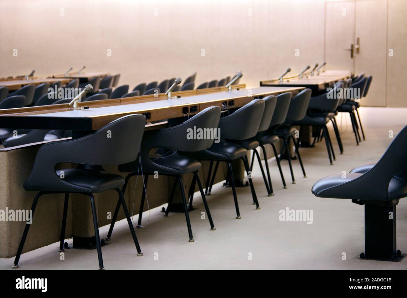 Conference room. Chairs at tables in a conference room. Photographed at ...