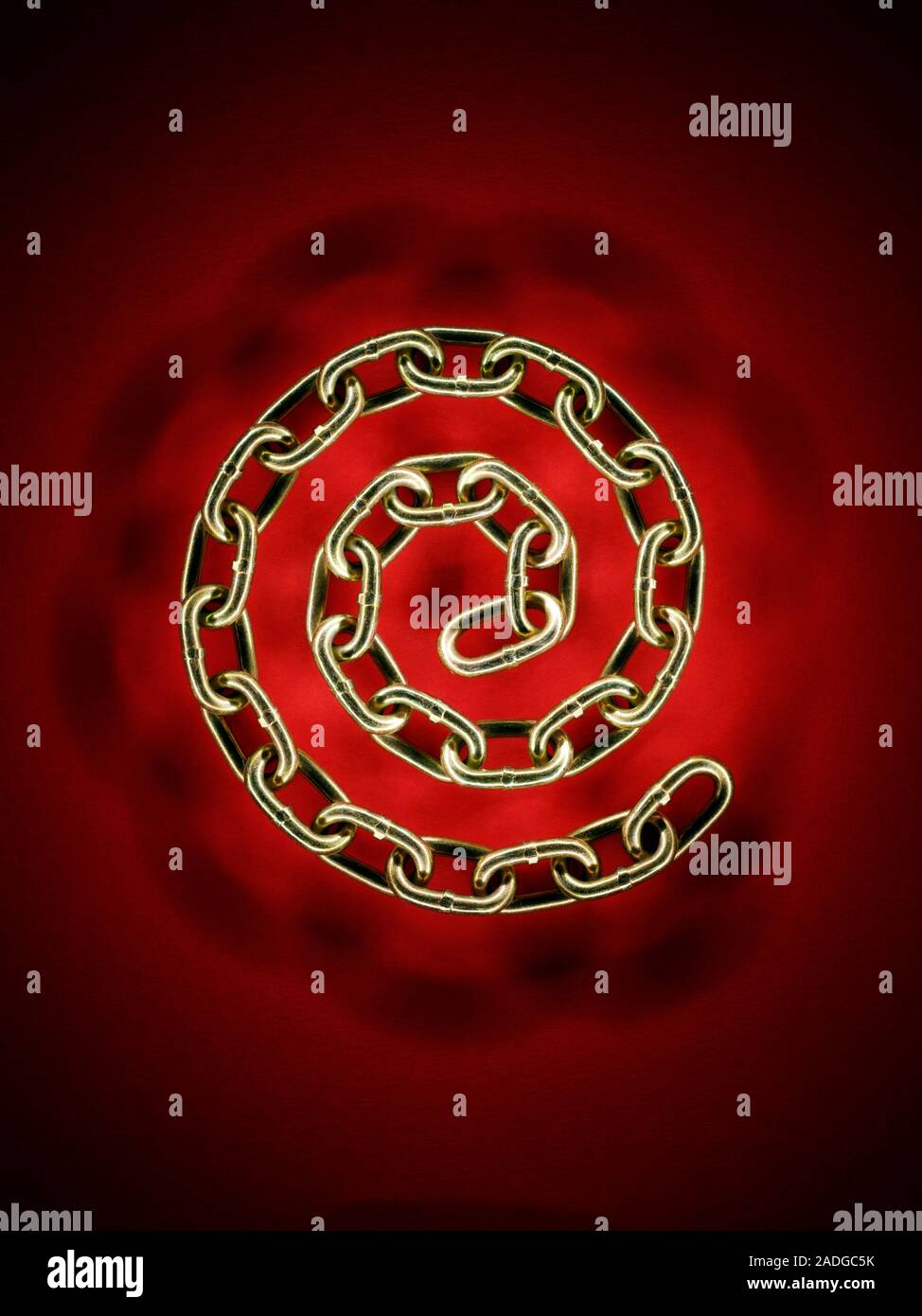 Chain arranged to form a spiral shape Stock Photo - Alamy