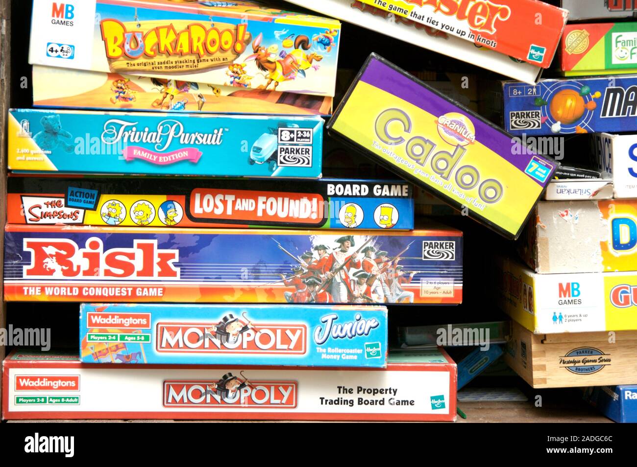 Indoor games. Board and skill games stacked on a shelf Stock Photo - Alamy