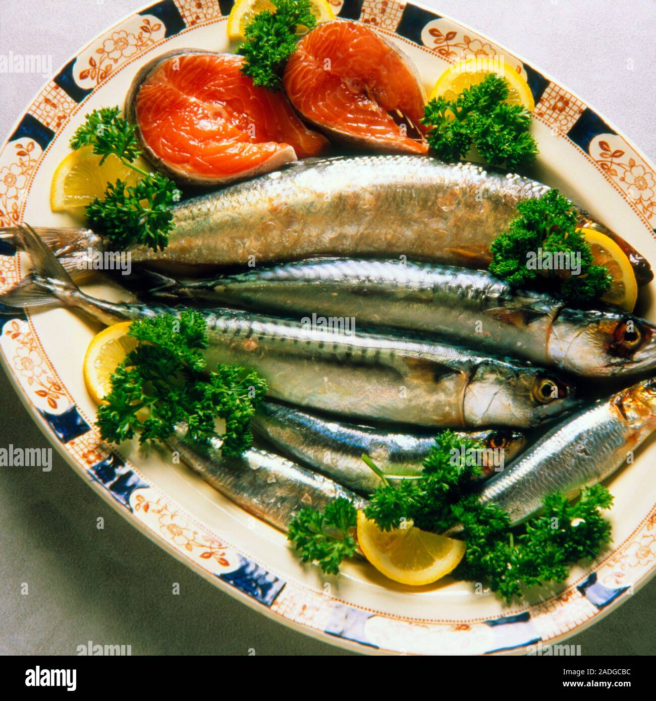 Oily fish; salmon, herring, mackerel and sardines (top to bottom). Fish ...