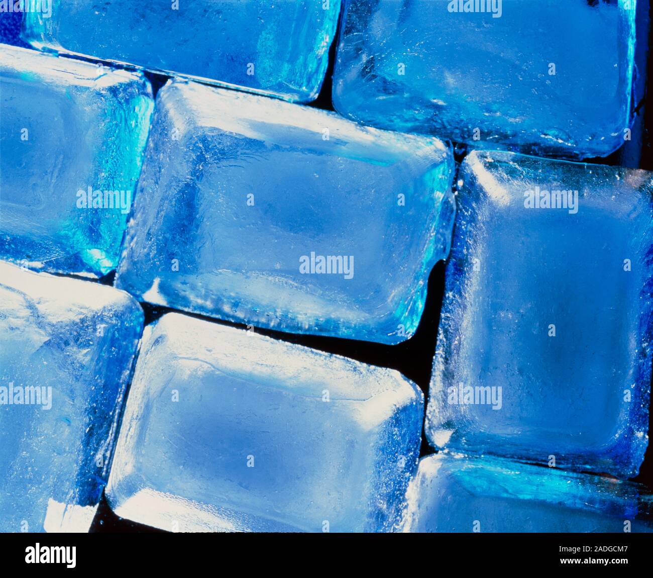Ice cubes. Rectangular blocks of frozen water as made in a refrigerator ...