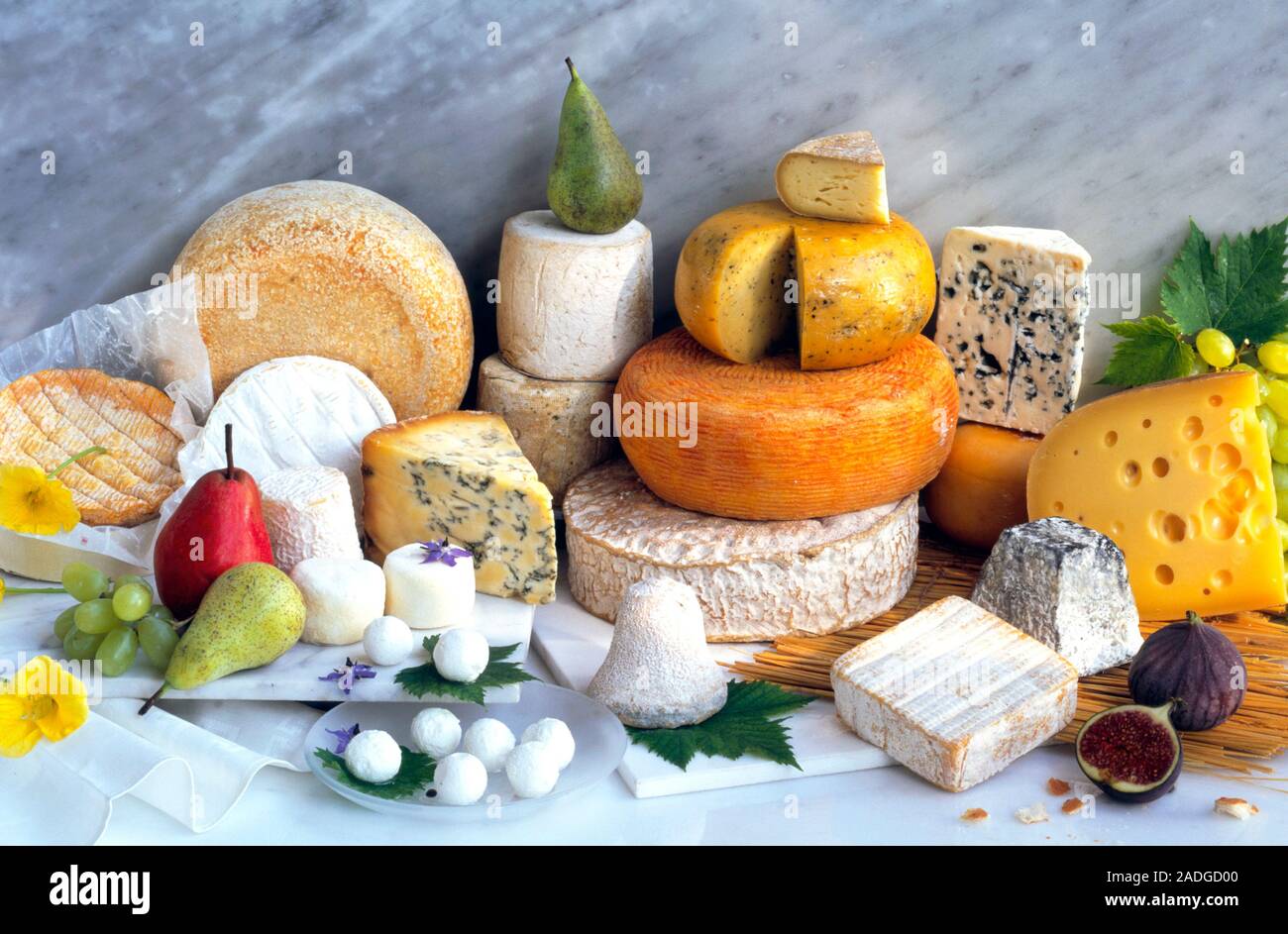 Cheeses. View of an assortment of cheeses. Cheese is a dairy product ...