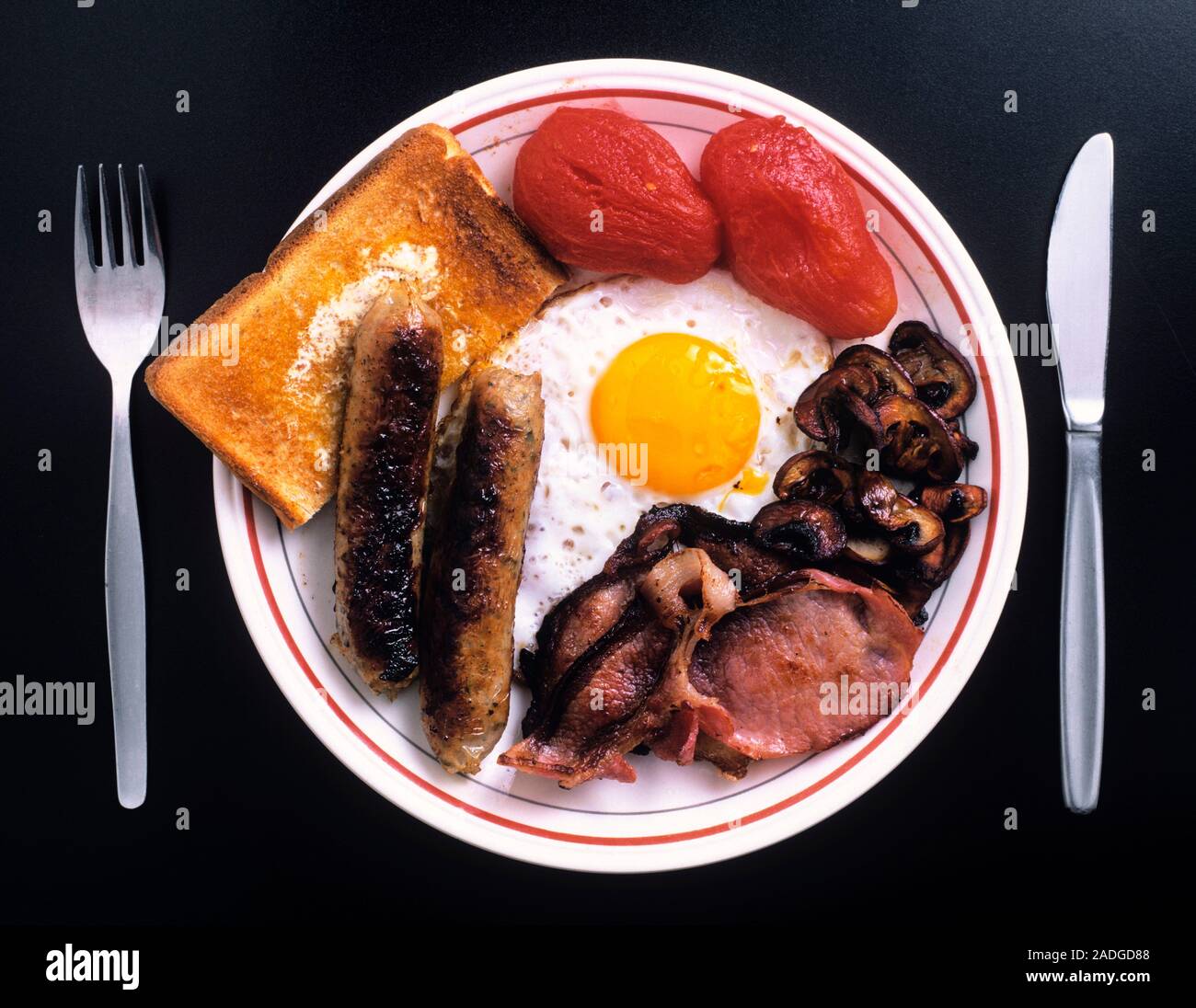 Fried food for a traditional English breakfast. Eggs are high in ...