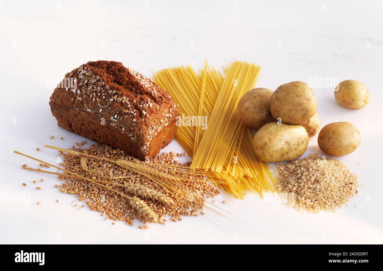 Carbohydrate-rich foods. Clockwise from lower left are: cereal grains ...