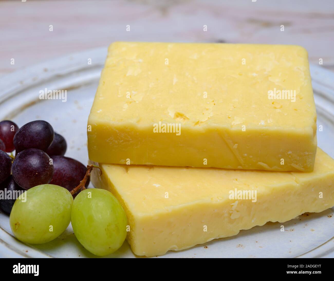 Cheese collection, blocks of matured english cheddar cheese close up ...