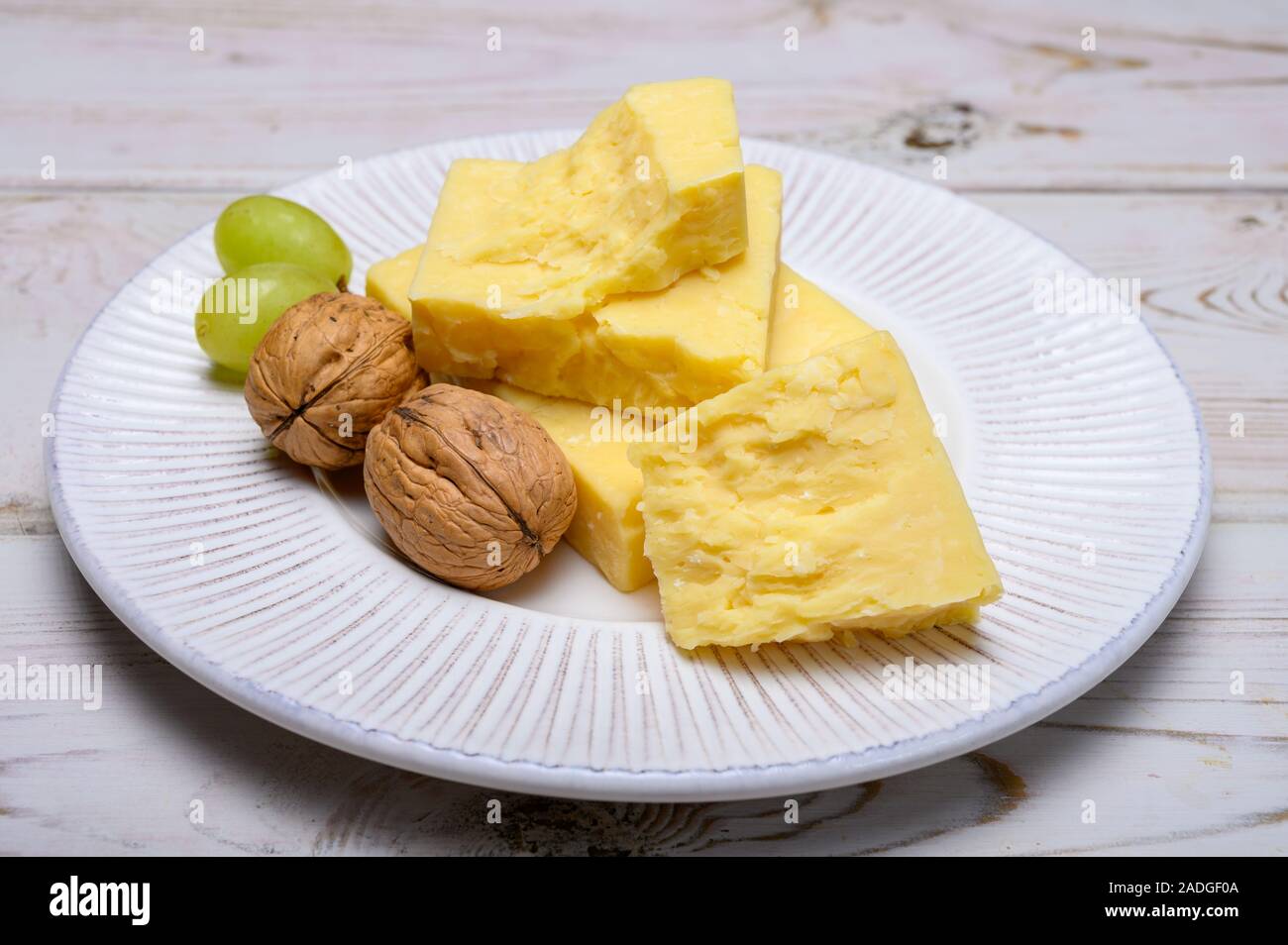 Cheese collection, blocks of matured english cheddar cheese close up ...