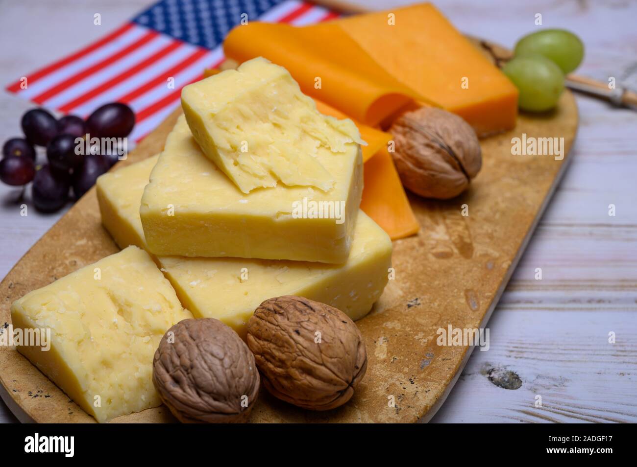 Cheese collection, blocks and slices of yellow and matured american ...