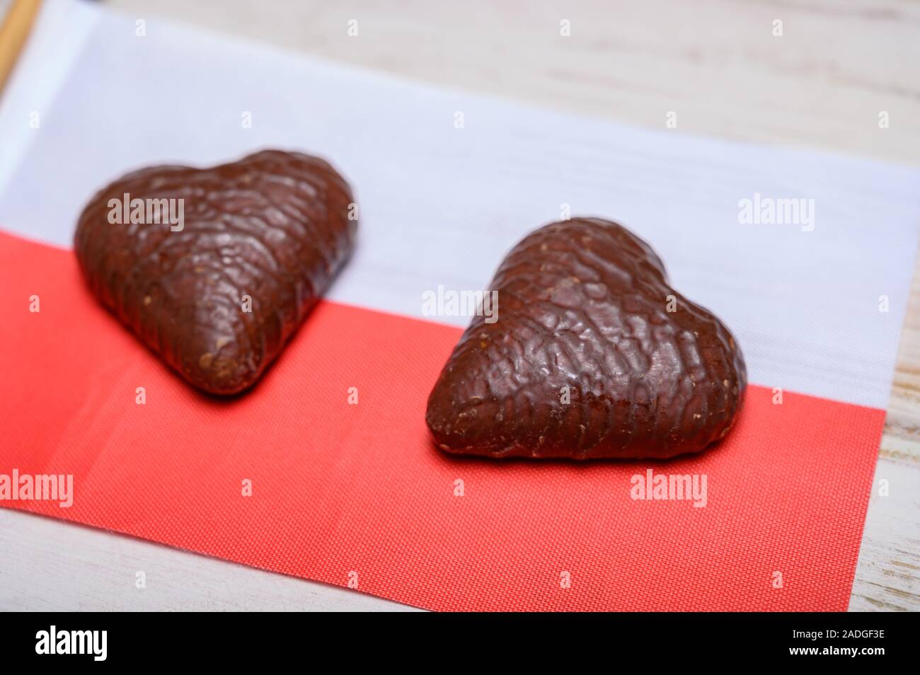 Tasty gingerbread glazed cookies from Torun, Poland and flag of Poland ...