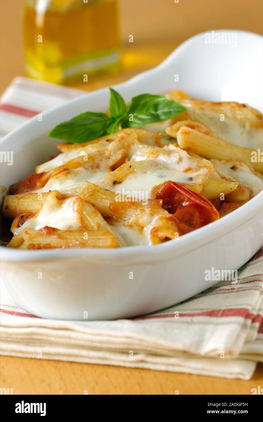Pasta al forno (baked pasta) in a dish. This Italian meal comes in many ...