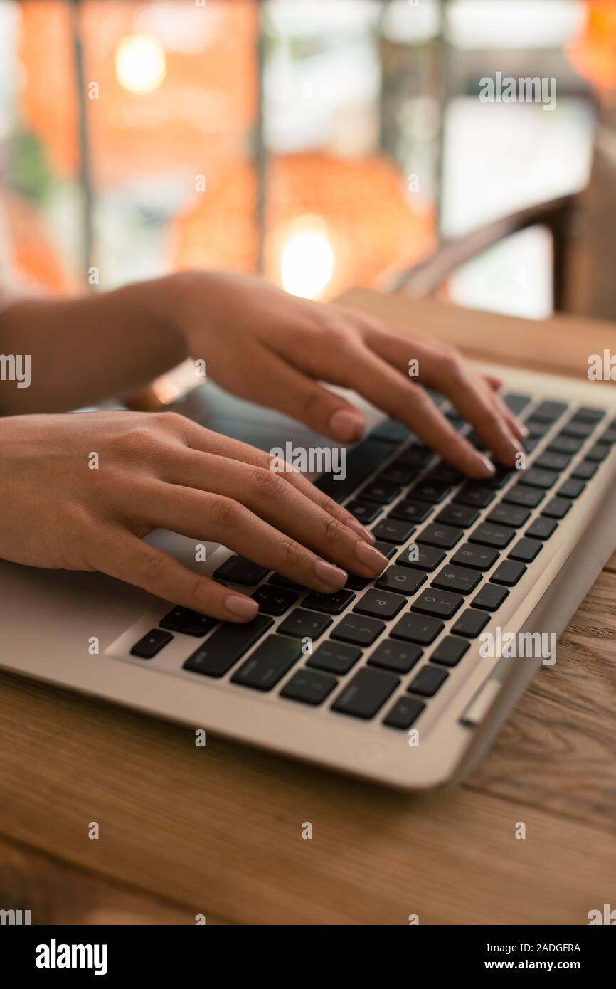 Hands type on keyboard hi-res stock photography and images - Alamy