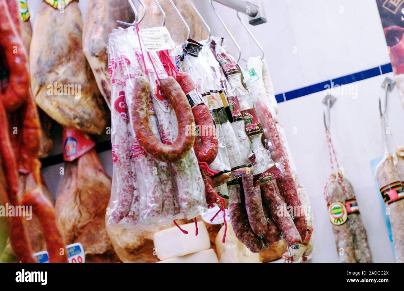Selection of meats, including chorizo and cuts of ham. Photographed in ...